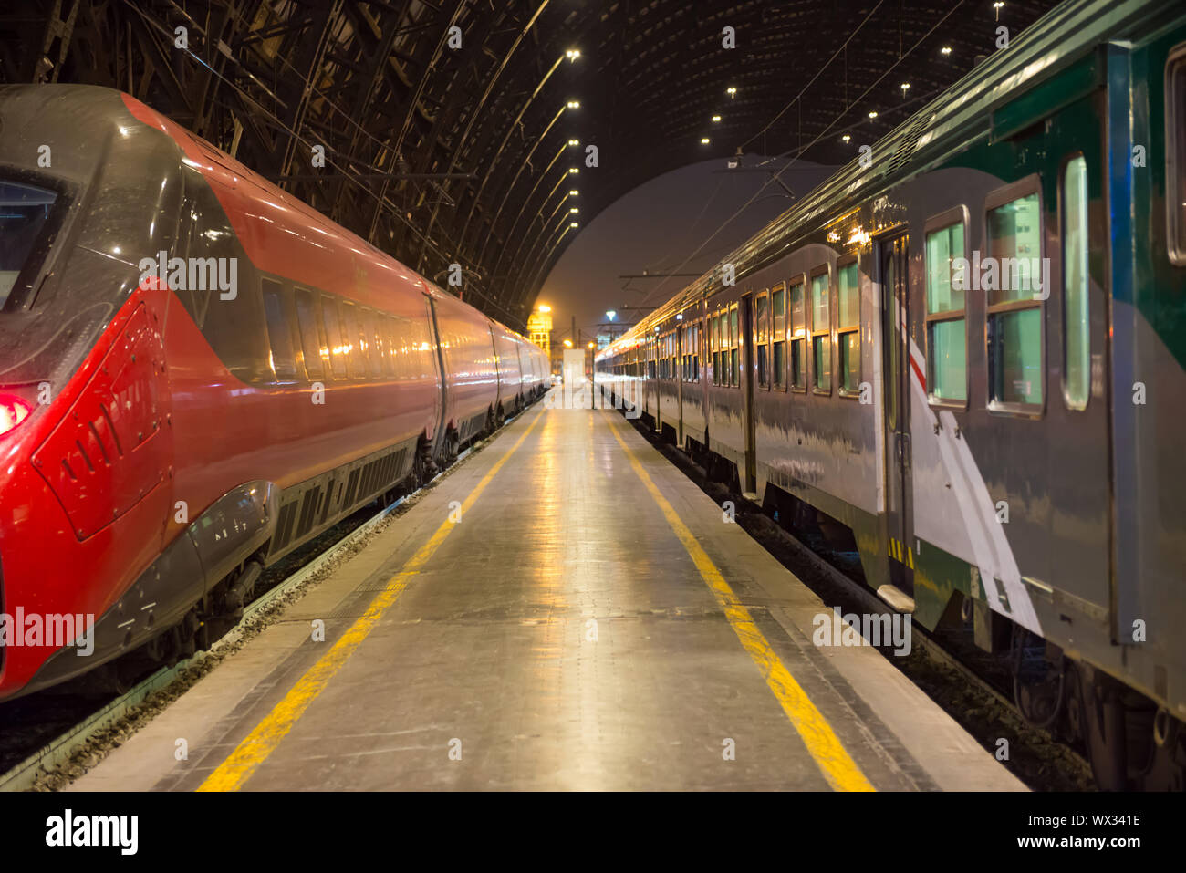 Modern trains on train station Stock Photo - Alamy