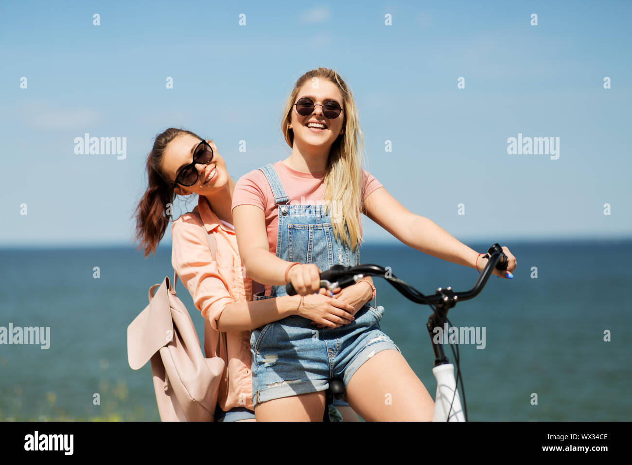 Girls bike sea hi-res stock photography and images - Alamy
