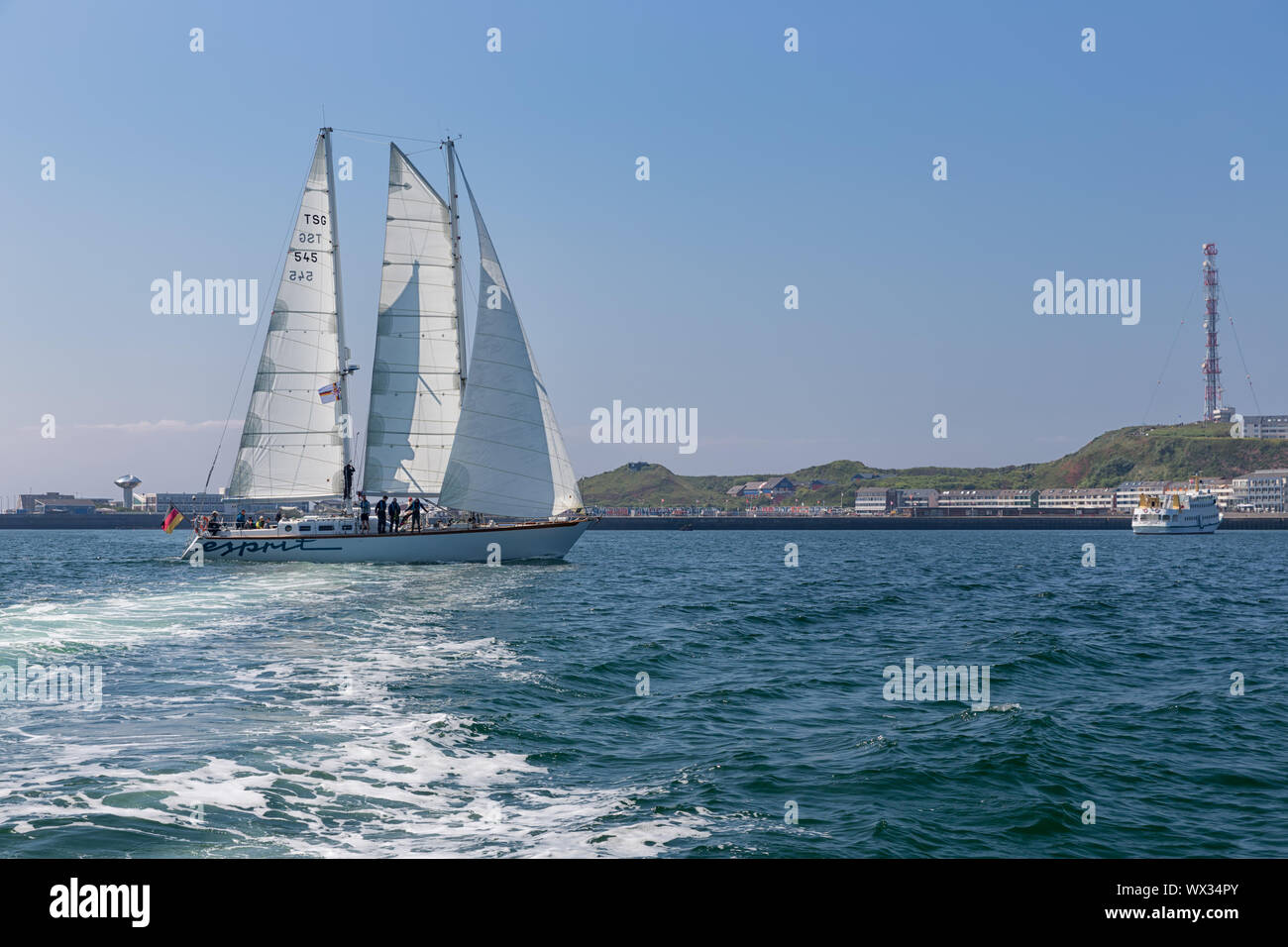 German sailing ship with passengers entering harbor of Helgoland Stock ...