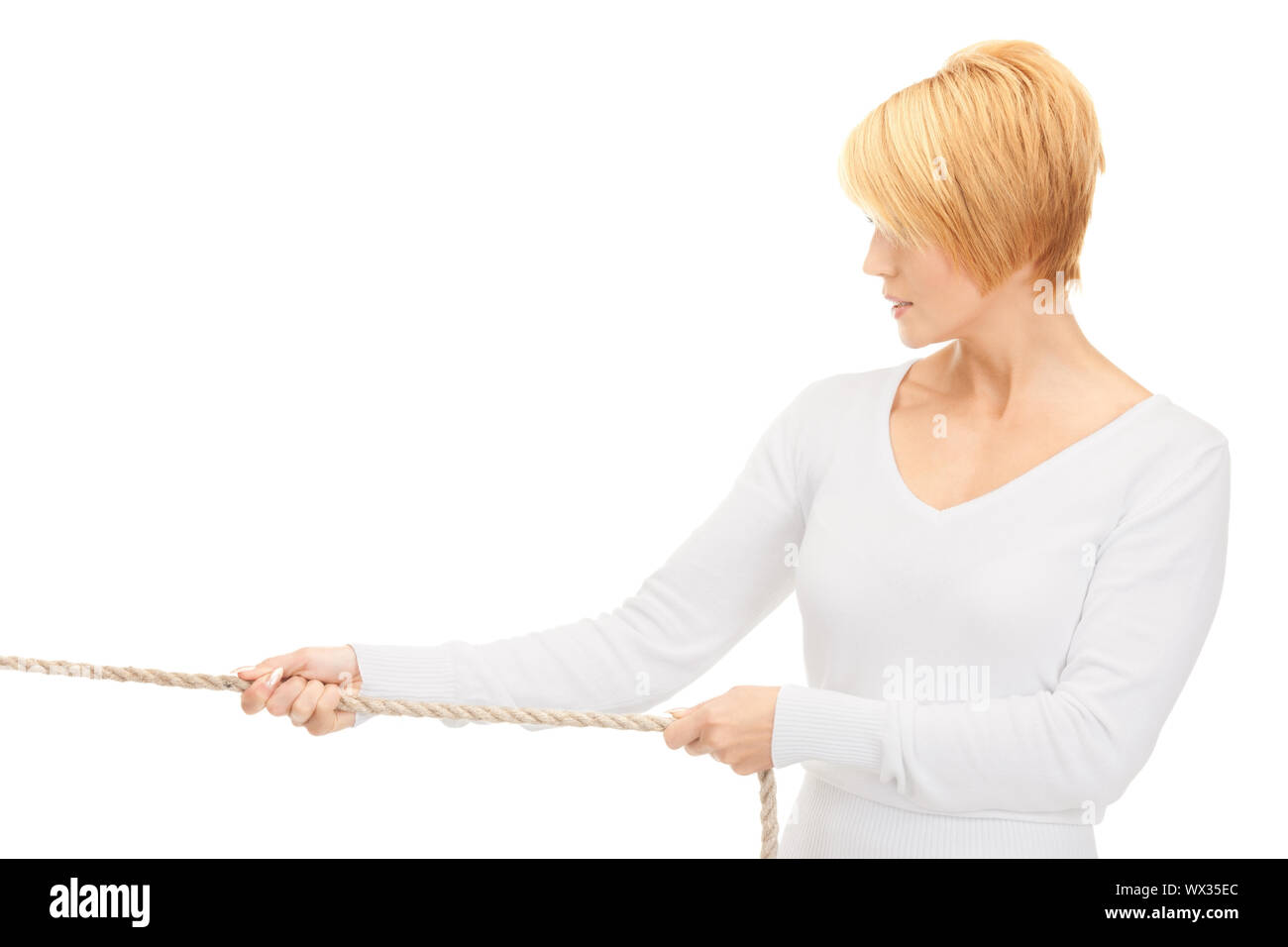 business woman pulling rope Stock Photo - Alamy