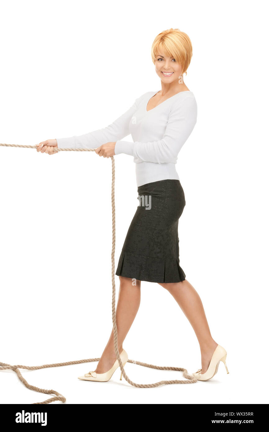 bright picture of business woman pulling rope Stock Photo - Alamy