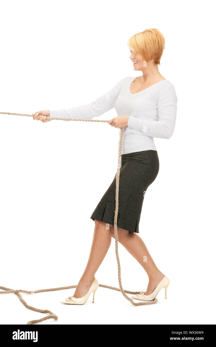 business woman pulling rope Stock Photo - Alamy
