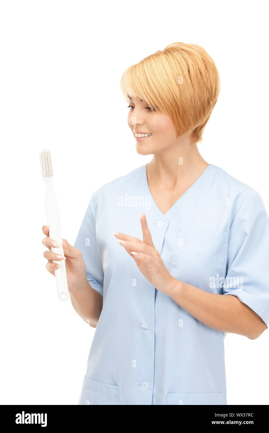 picture of attractive female doctor with toothbrush Stock Photo - Alamy