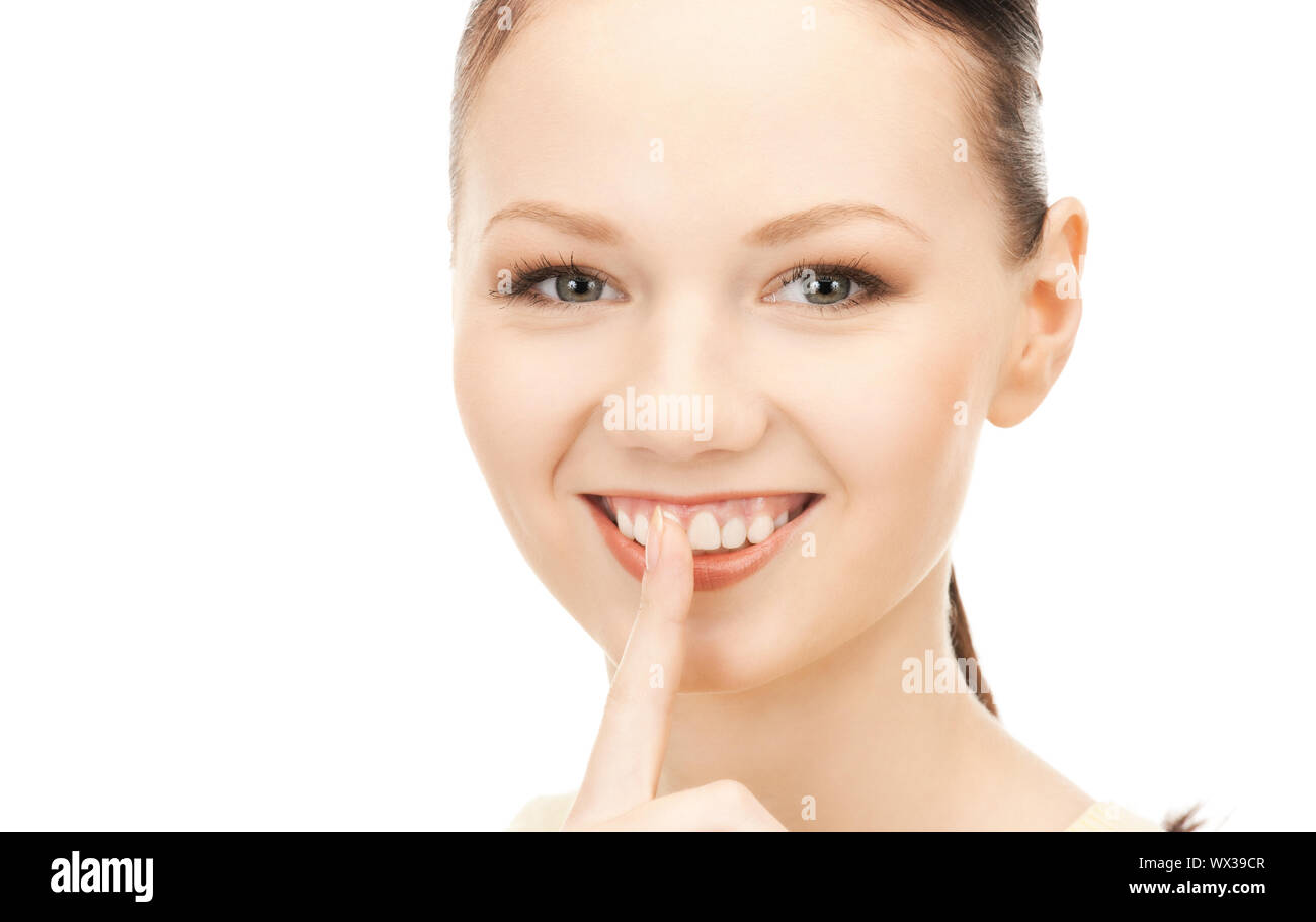 finger on lips Stock Photo - Alamy