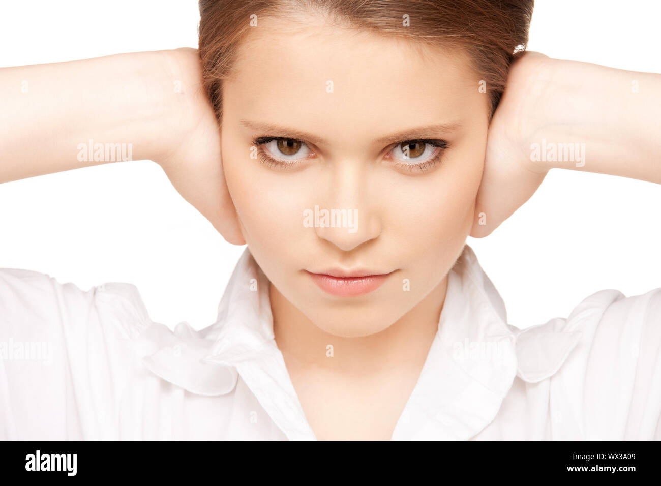 woman with hands on ears Stock Photo - Alamy