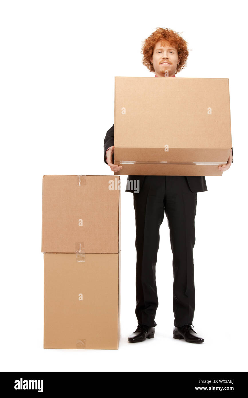 Attractive businessman big boxes hi-res stock photography and images ...