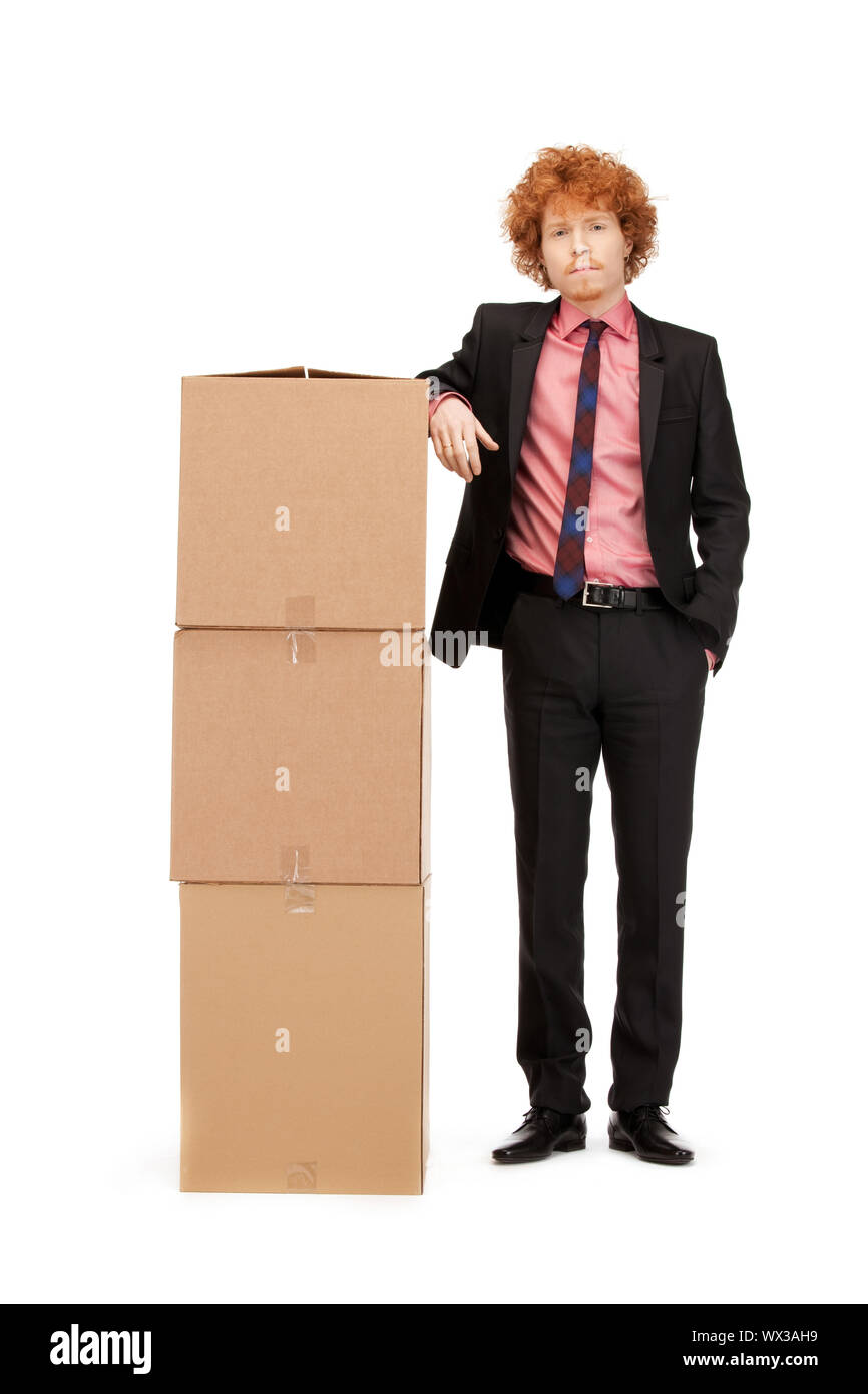 picture of attractive businessman with big boxes Stock Photo - Alamy
