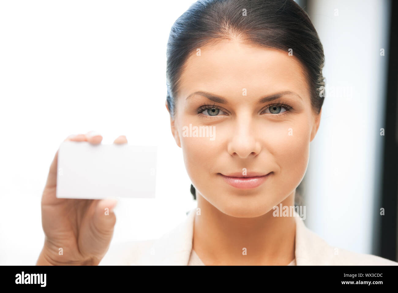 woman with business card Stock Photo - Alamy