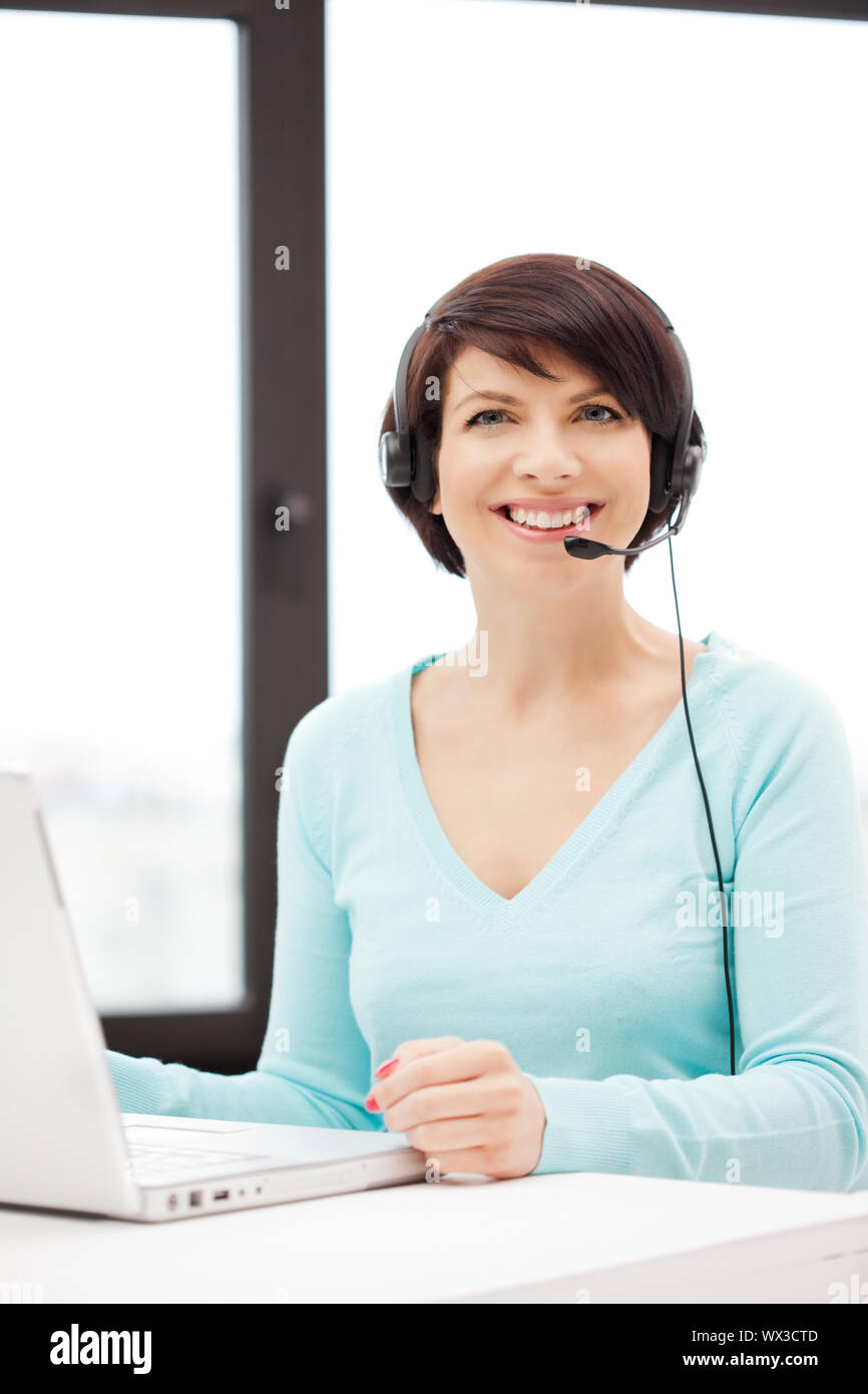helpline operator with laptop computer Stock Photo - Alamy