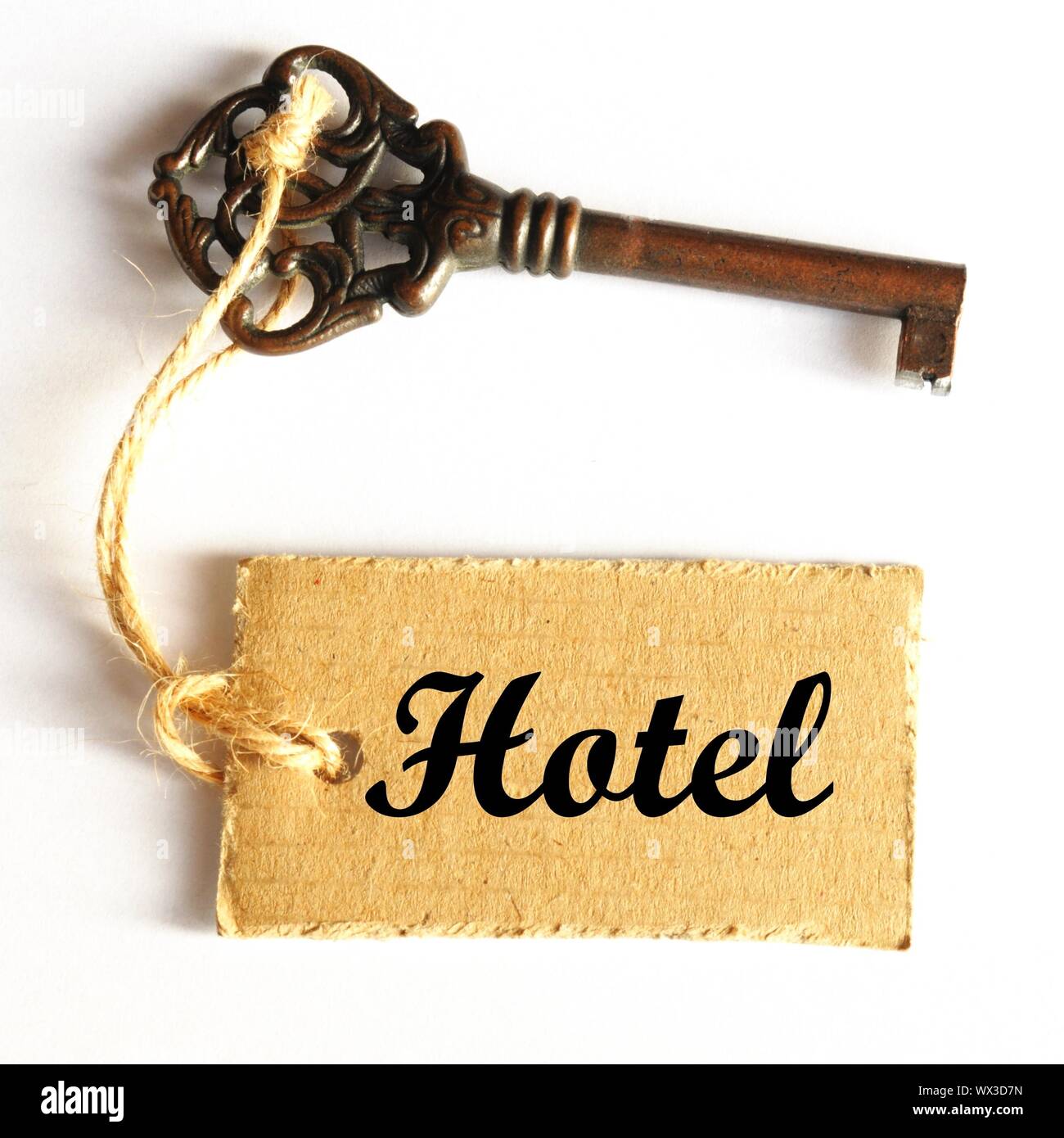 travel concept with hotel key and tag or label Stock Photo - Alamy