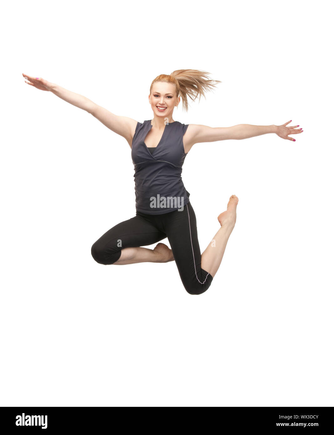 bright picture of happy jumping sporty girl Stock Photo - Alamy
