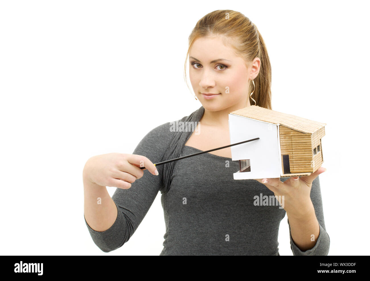 lovely lady with small house model and pointer in hands Stock Photo - Alamy
