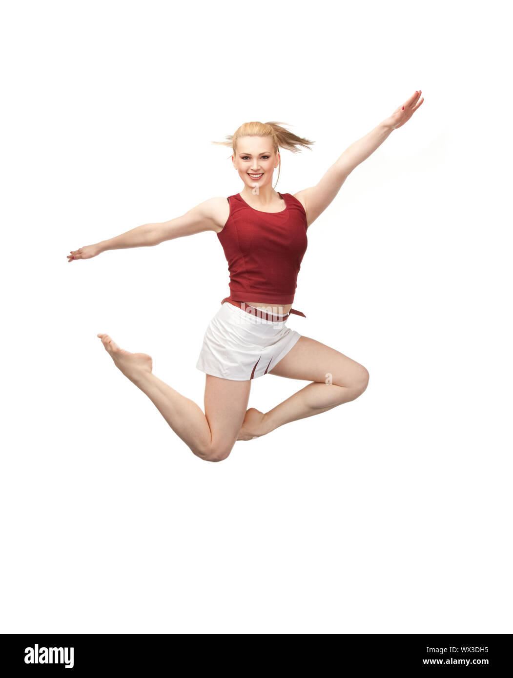 bright picture of happy jumping sporty girl Stock Photo - Alamy