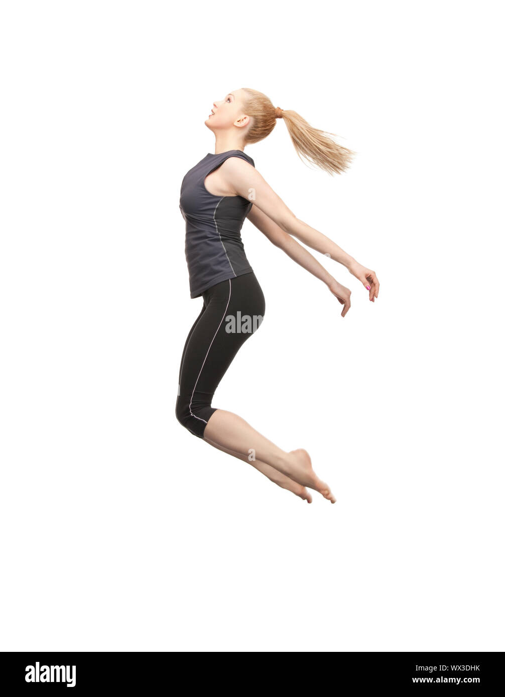 bright picture of happy jumping sporty girl Stock Photo - Alamy