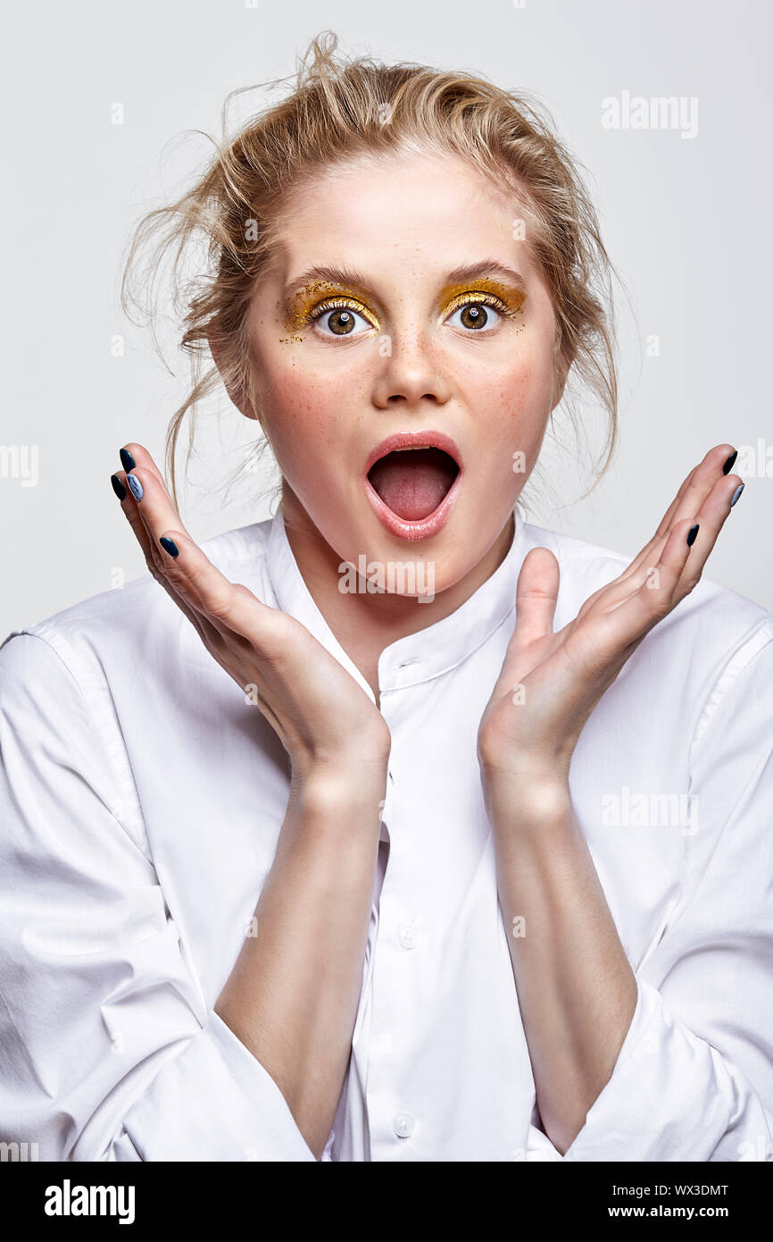 Female with expression of surprise on face Stock Photo - Alamy
