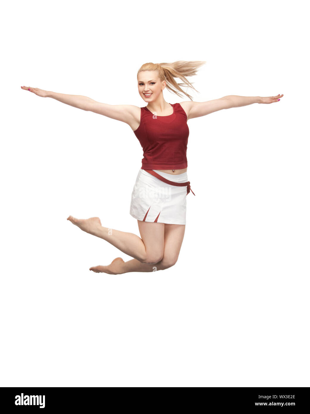 bright picture of happy jumping sporty girl Stock Photo - Alamy