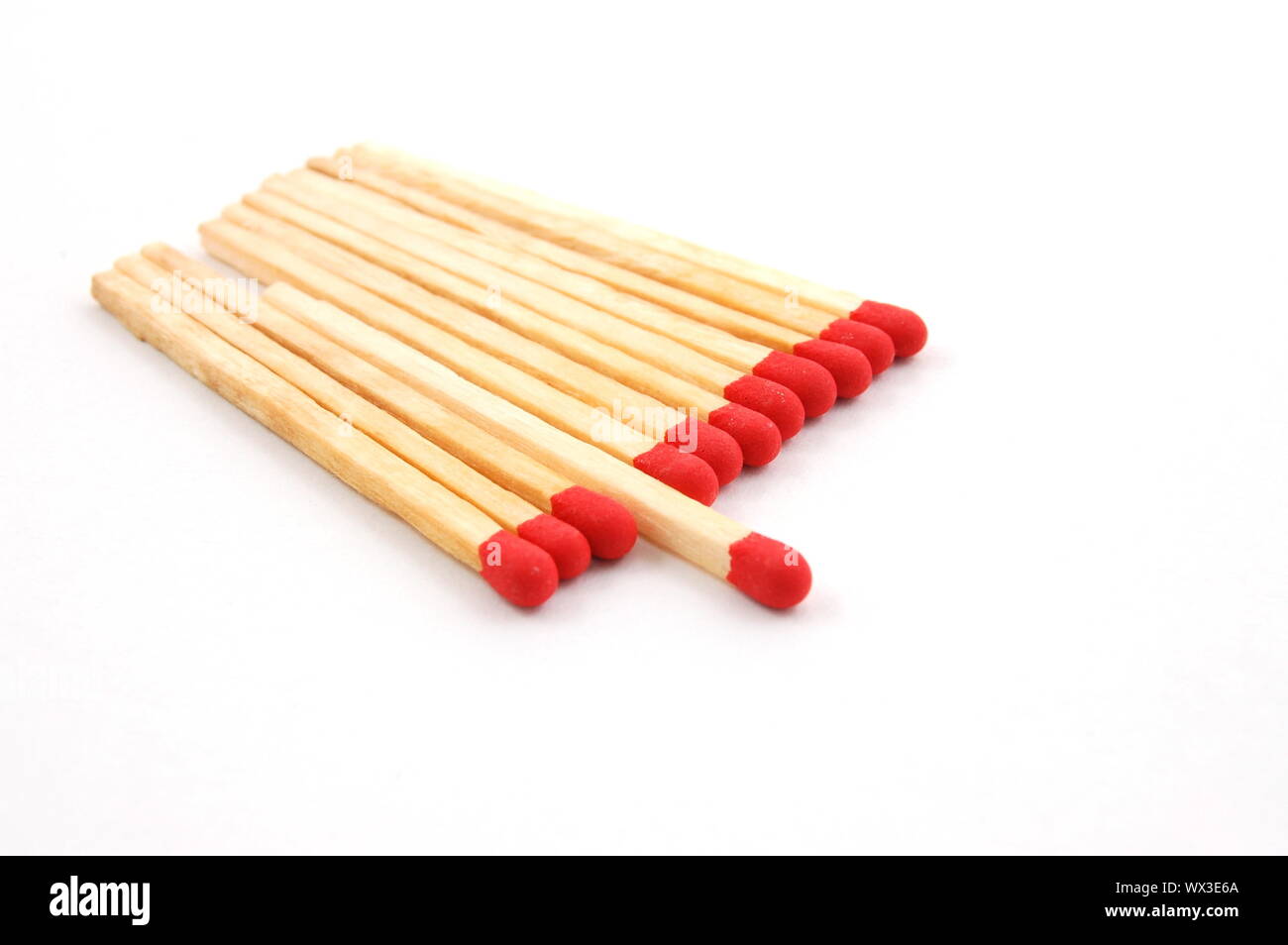 Some red matches isolated on a white background Stock Photo - Alamy