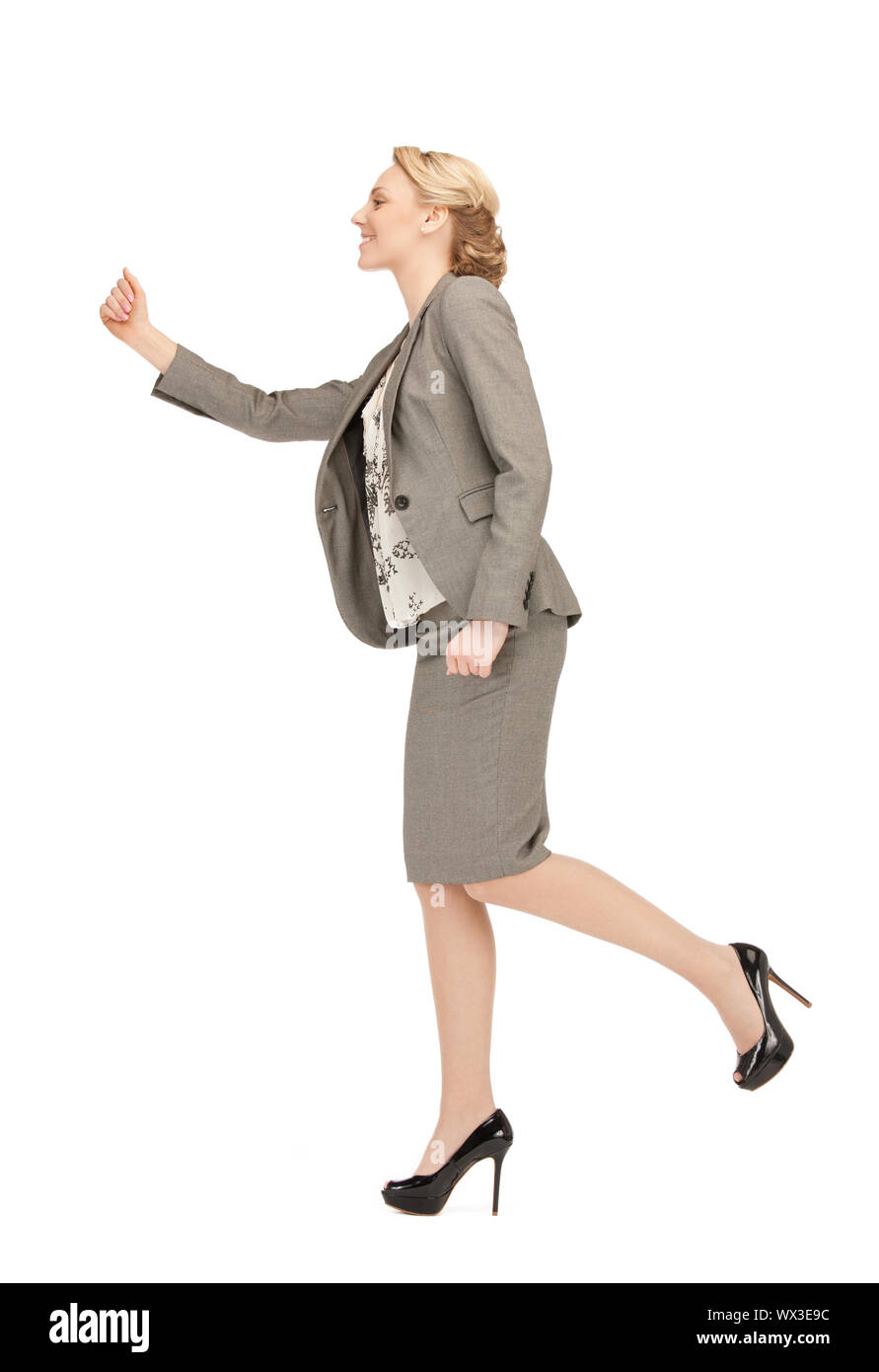 bright picture of happy and smiling walking woman Stock Photo - Alamy