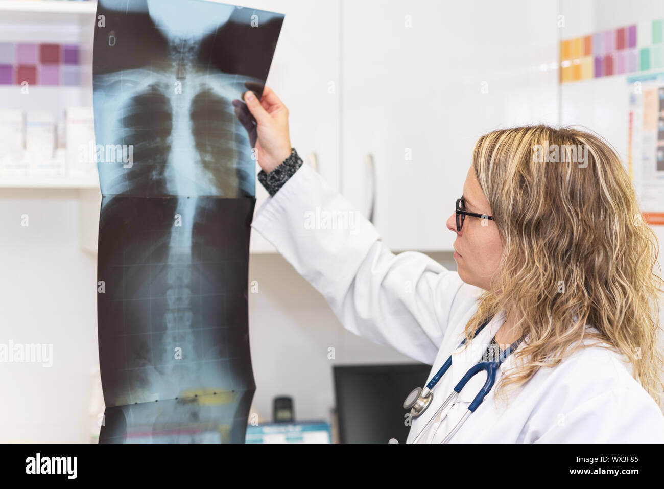 Female doctor looking chest xray hi-res stock photography and images ...