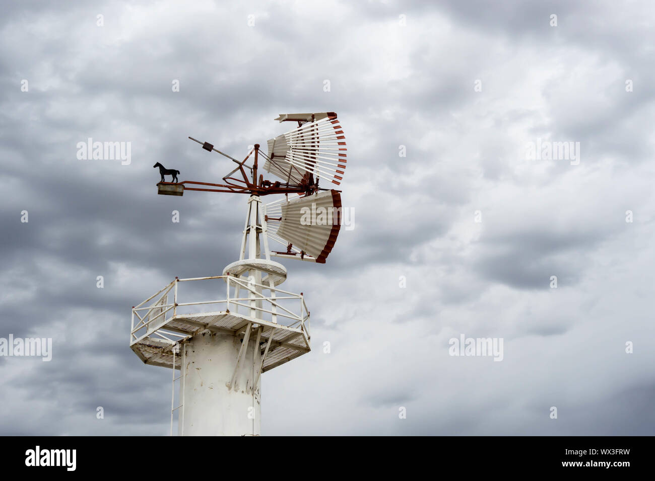old metal wind wheel in Texas Stock Photo - Alamy