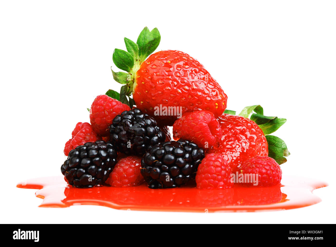 big berry pile in syrup isolated on white Stock Photo - Alamy