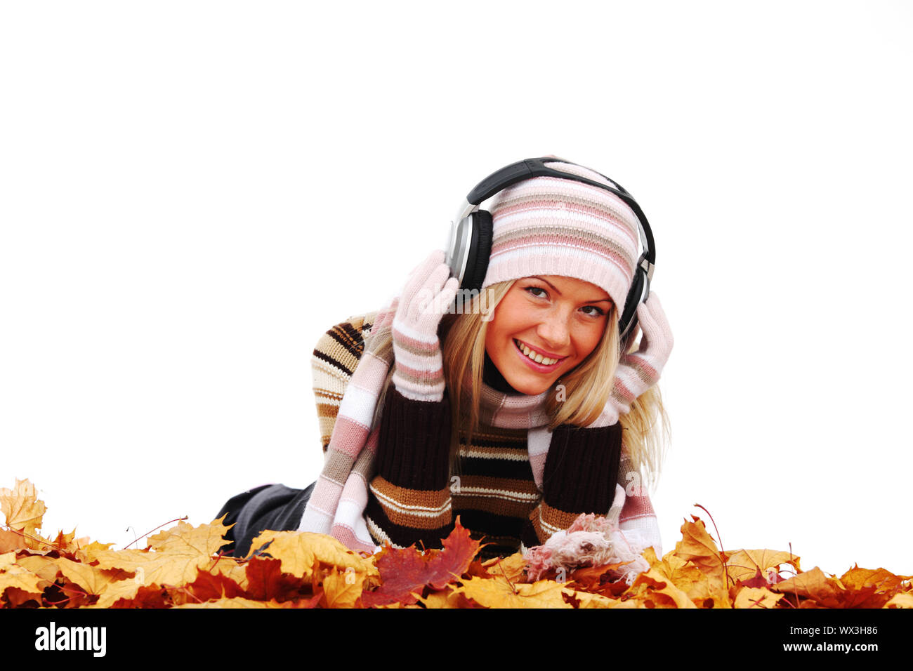 autumn woman listening music in studio Stock Photo - Alamy