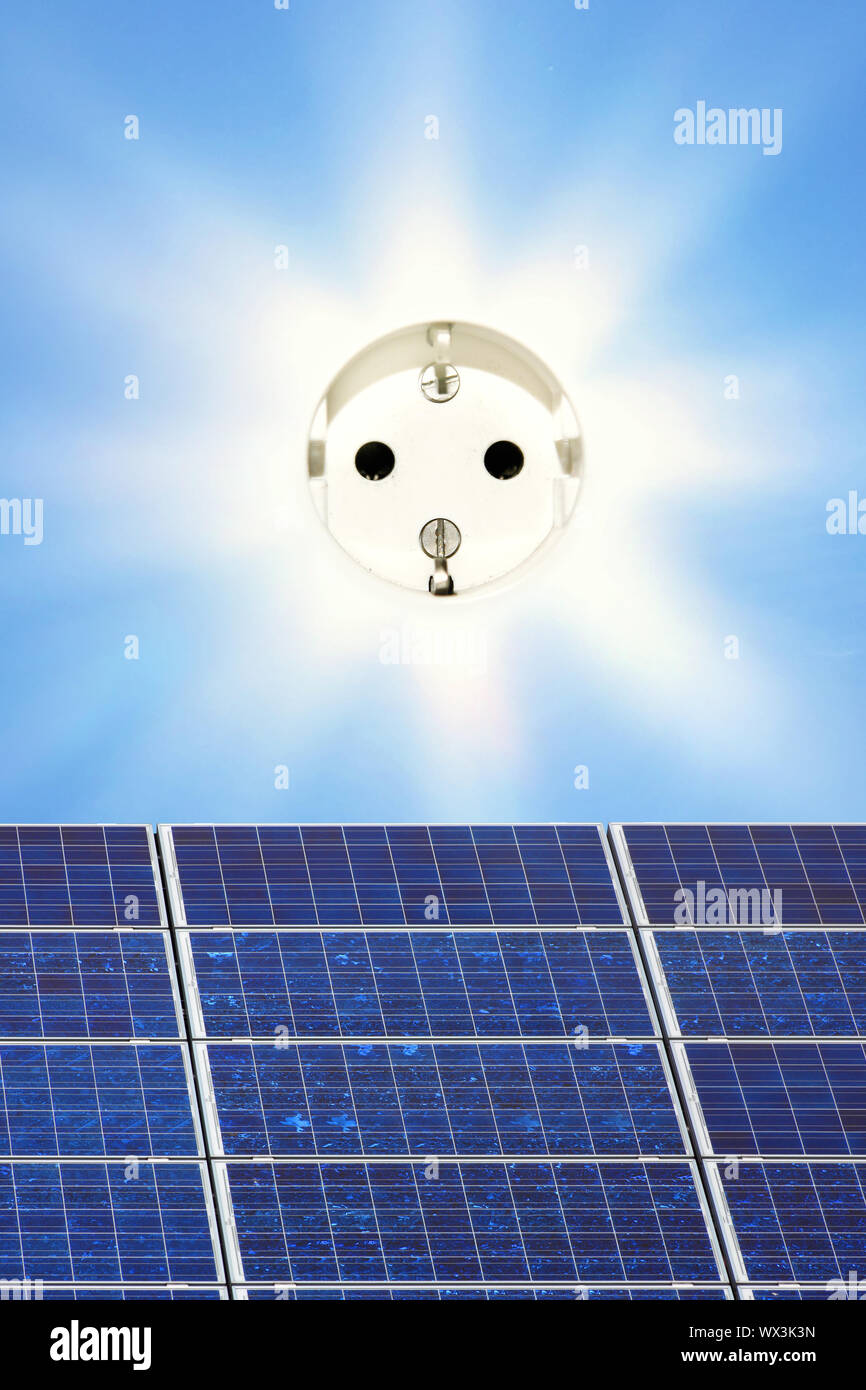 Symbol picture with photovoltaic system Sun and socket Stock Photo - Alamy