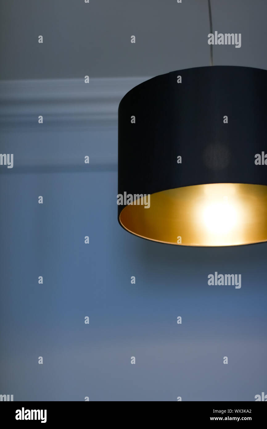 Interior design, indoor lamps and electricity concept - Golden lamp in ...