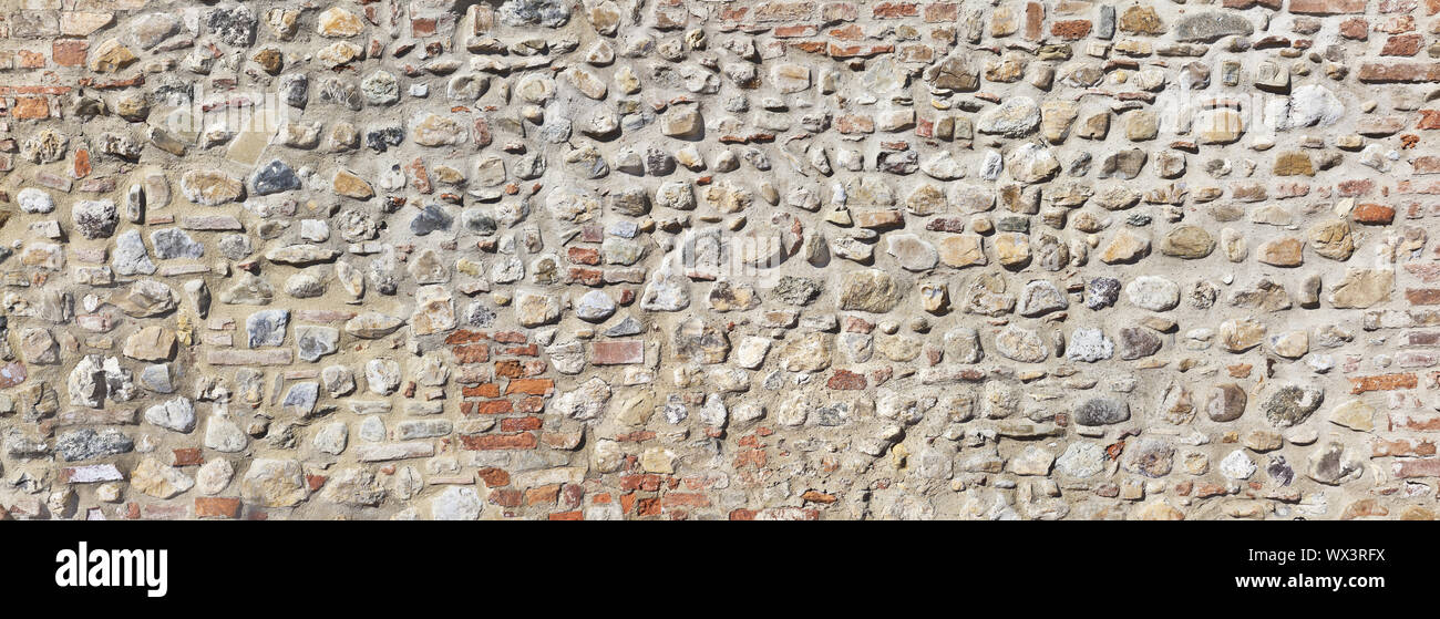 Rough stone wall in poster size Stock Photo - Alamy