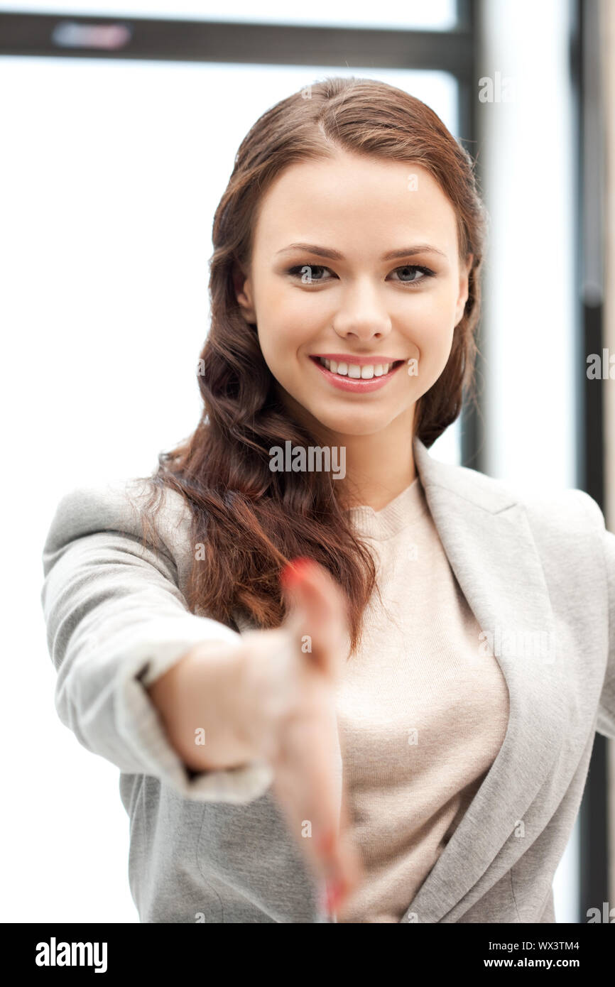 lovely woman with an open hand ready for handshake Stock Photo - Alamy