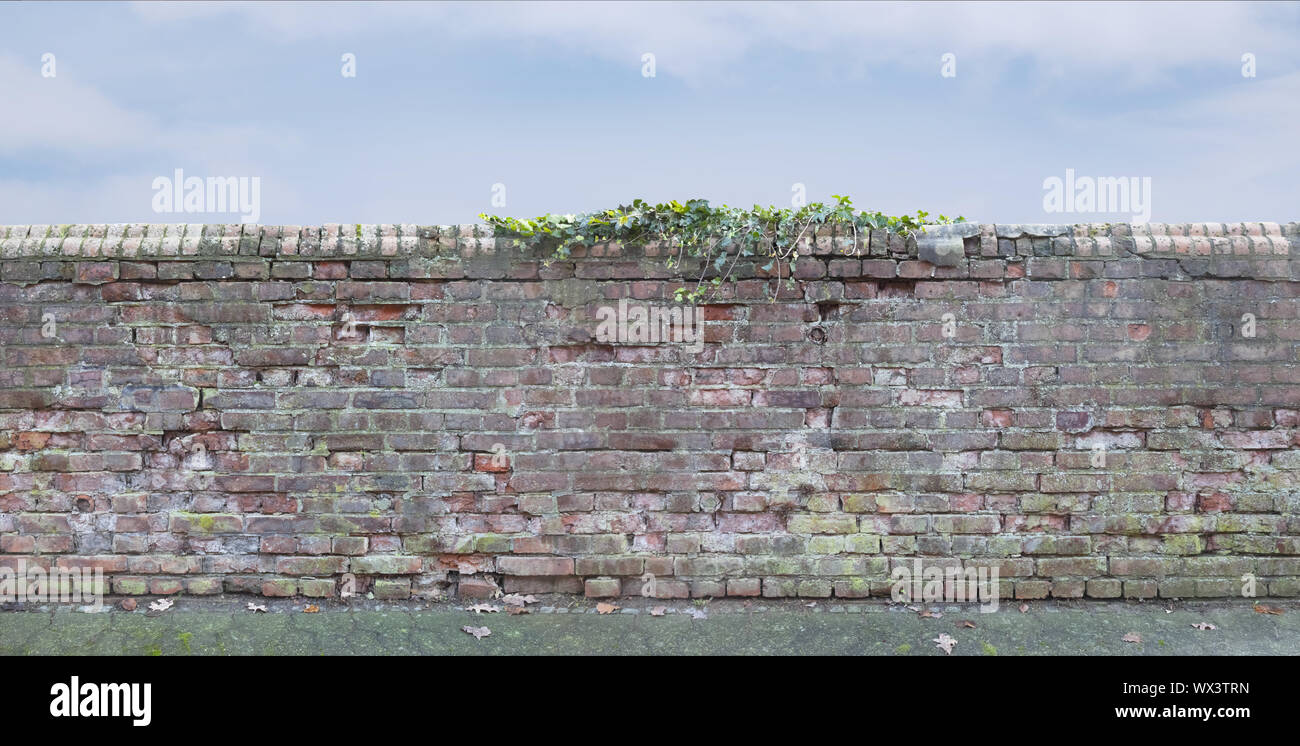 Stones in brick wall hi-res stock photography and images - Alamy