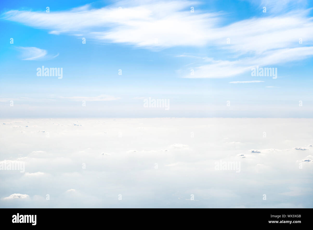 Clear blue sky and clouds Stock Photo - Alamy