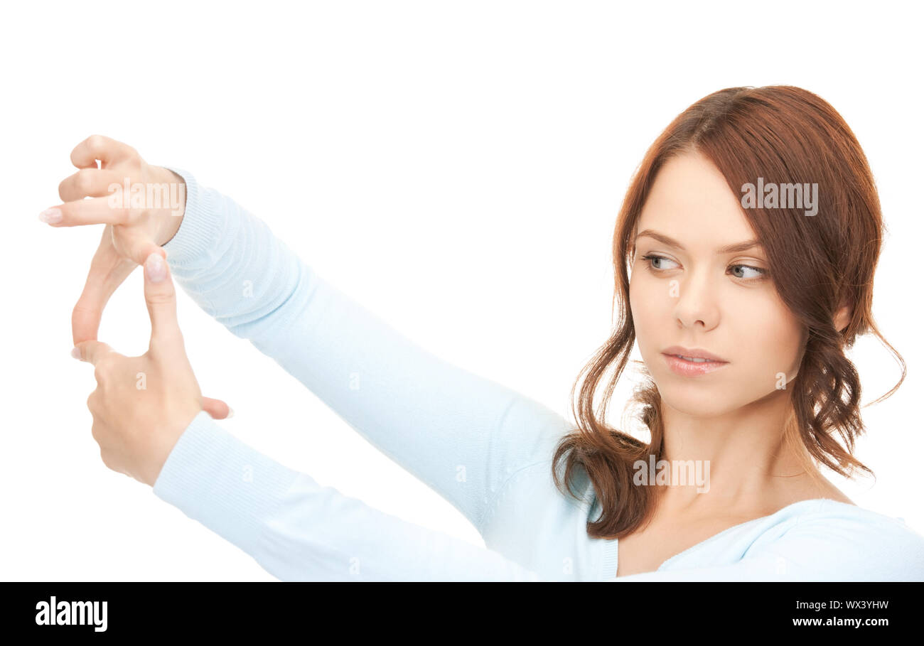 picture of lovely woman creating a frame with fingers Stock Photo - Alamy