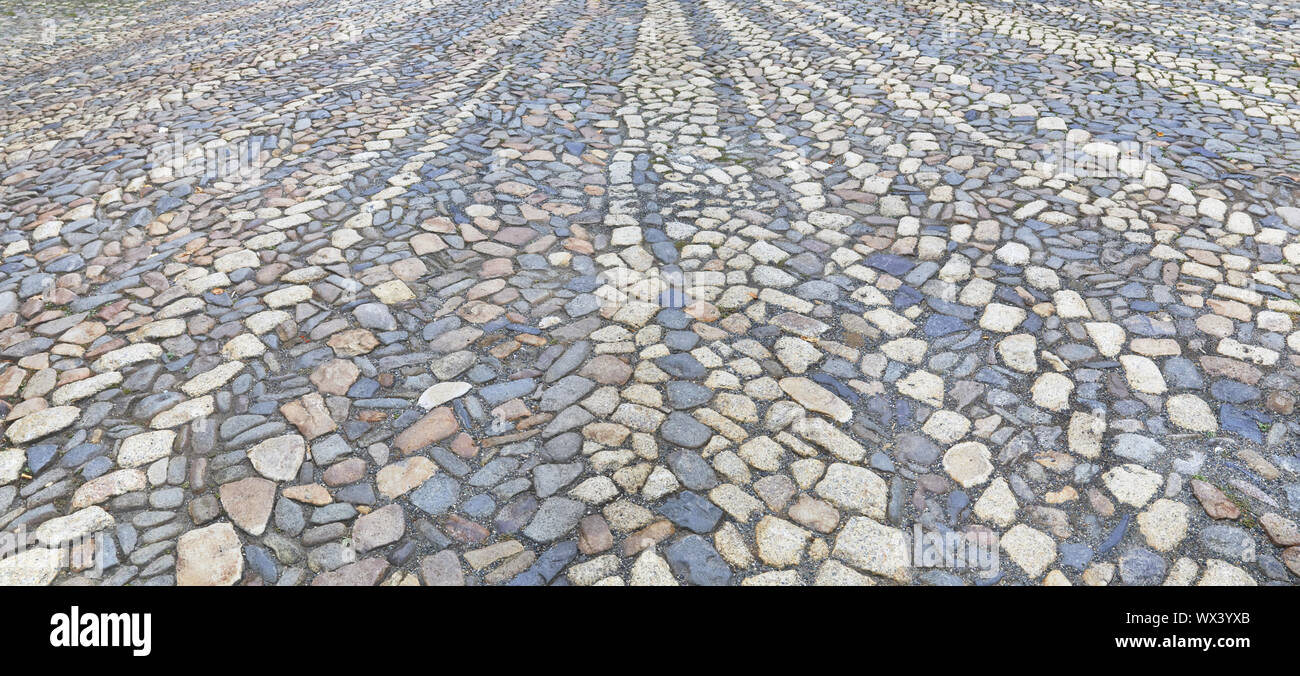 Rustic medieval cobblestone street Stock Photo - Alamy