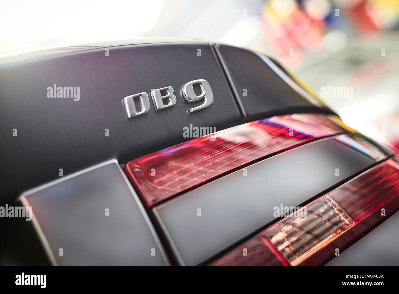 Rear section of an Aston Martin DB9 showing the DB9 badge Stock Photo ...