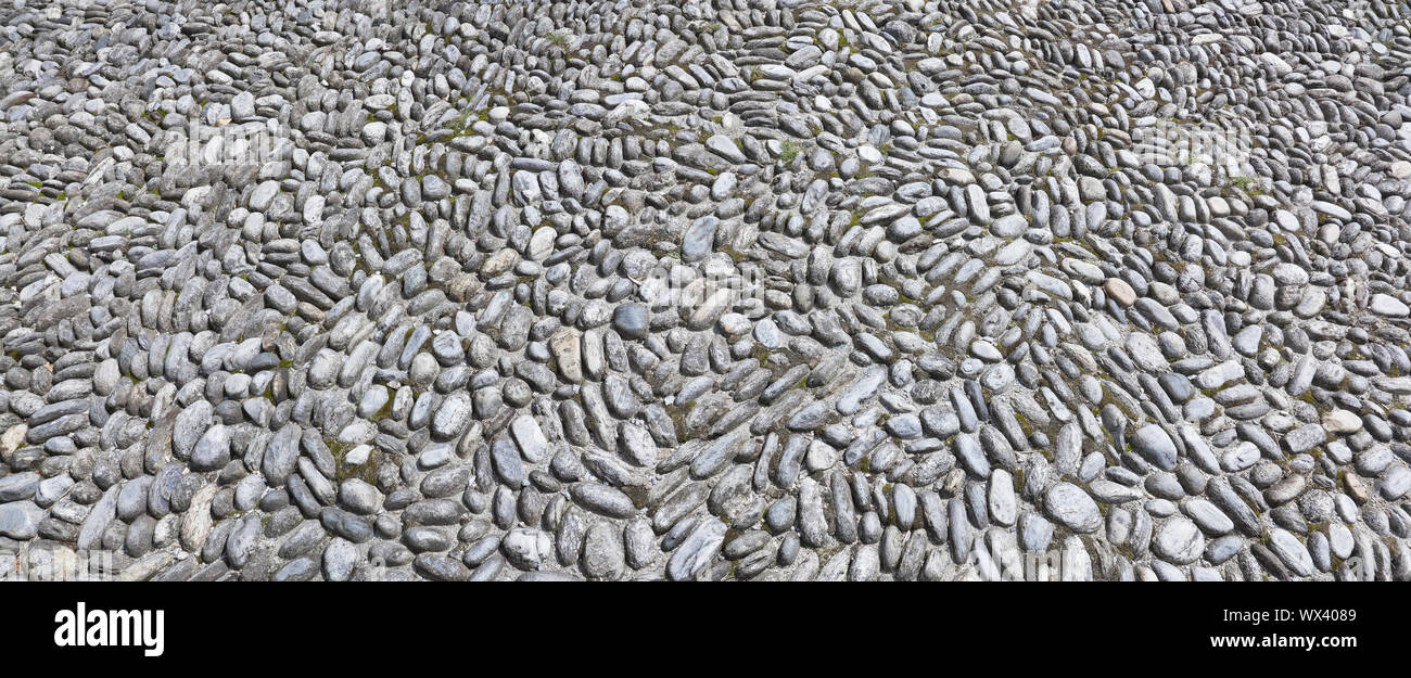 Rustic medieval cobblestone street Stock Photo - Alamy