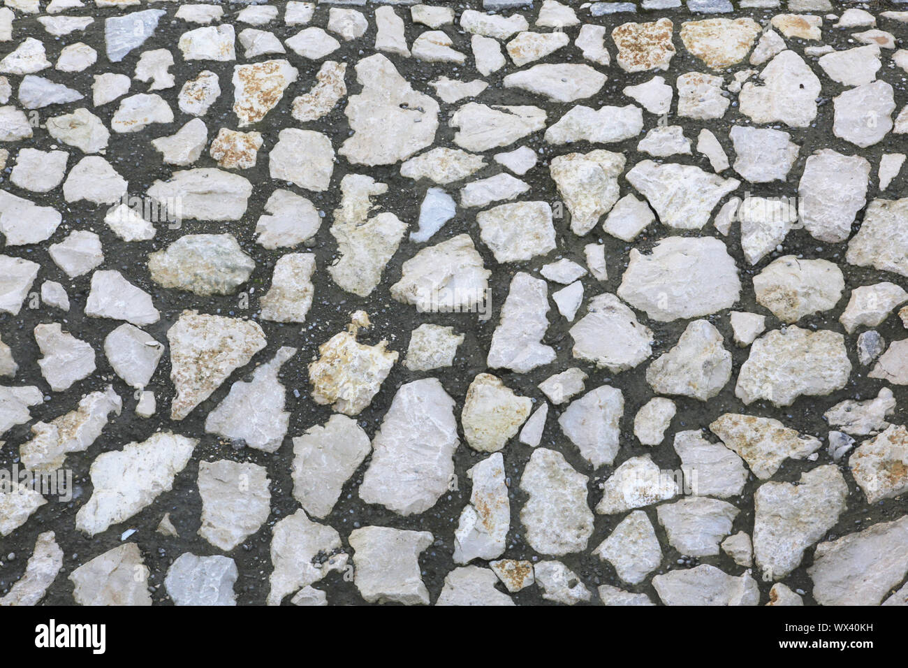 Rustic medieval cobblestone street Stock Photo - Alamy