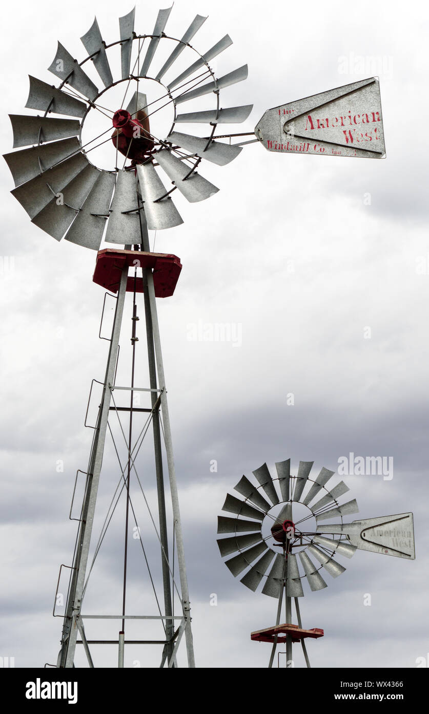 two wind wheels or wind pumps up close Stock Photo - Alamy