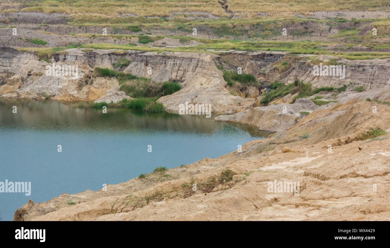 Generated Rock Cliff of large Blue Lake in a Mining Pit of Thailand ...