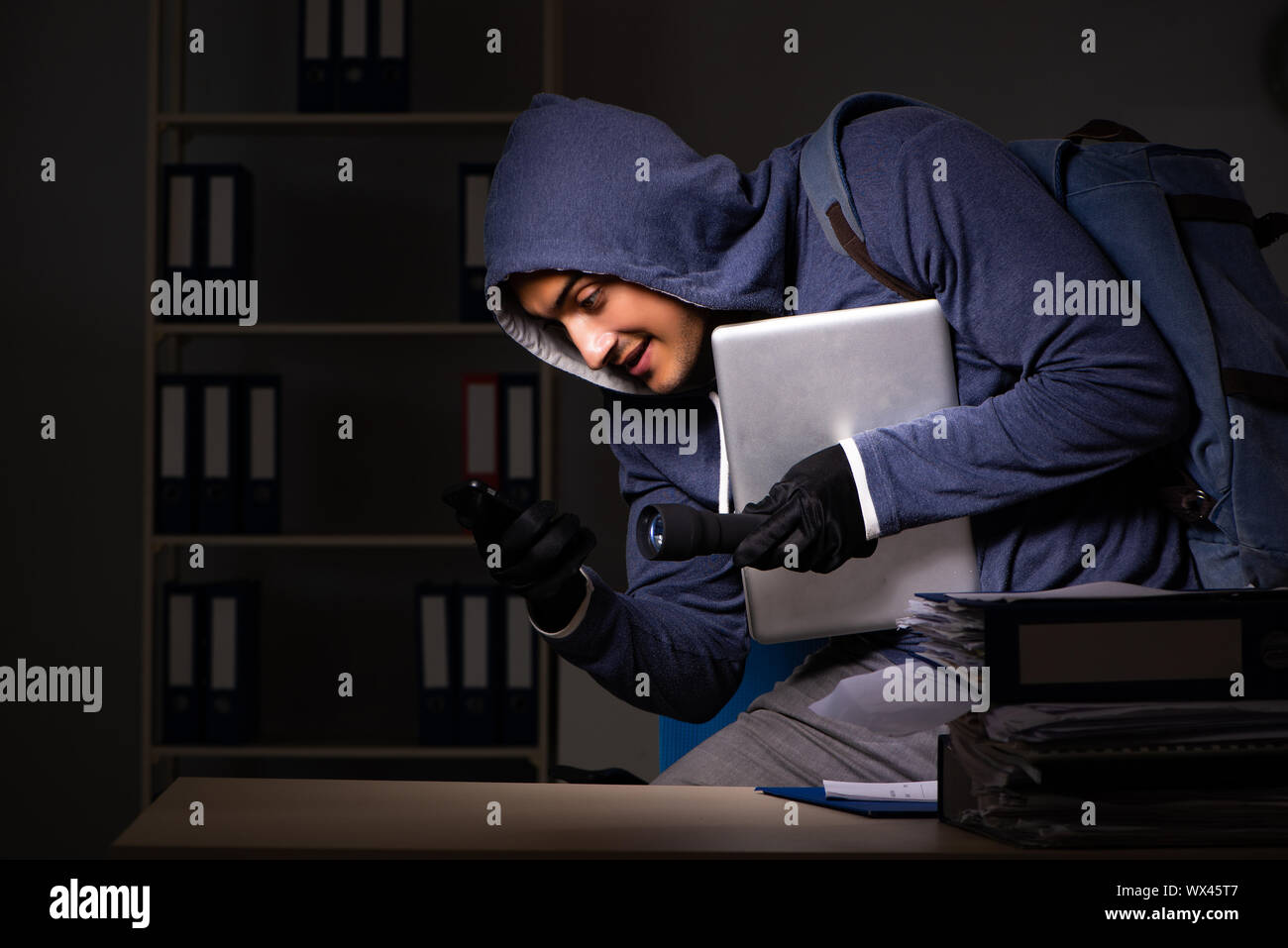 The thief trying to steal personal data in identity theft concept Stock ...