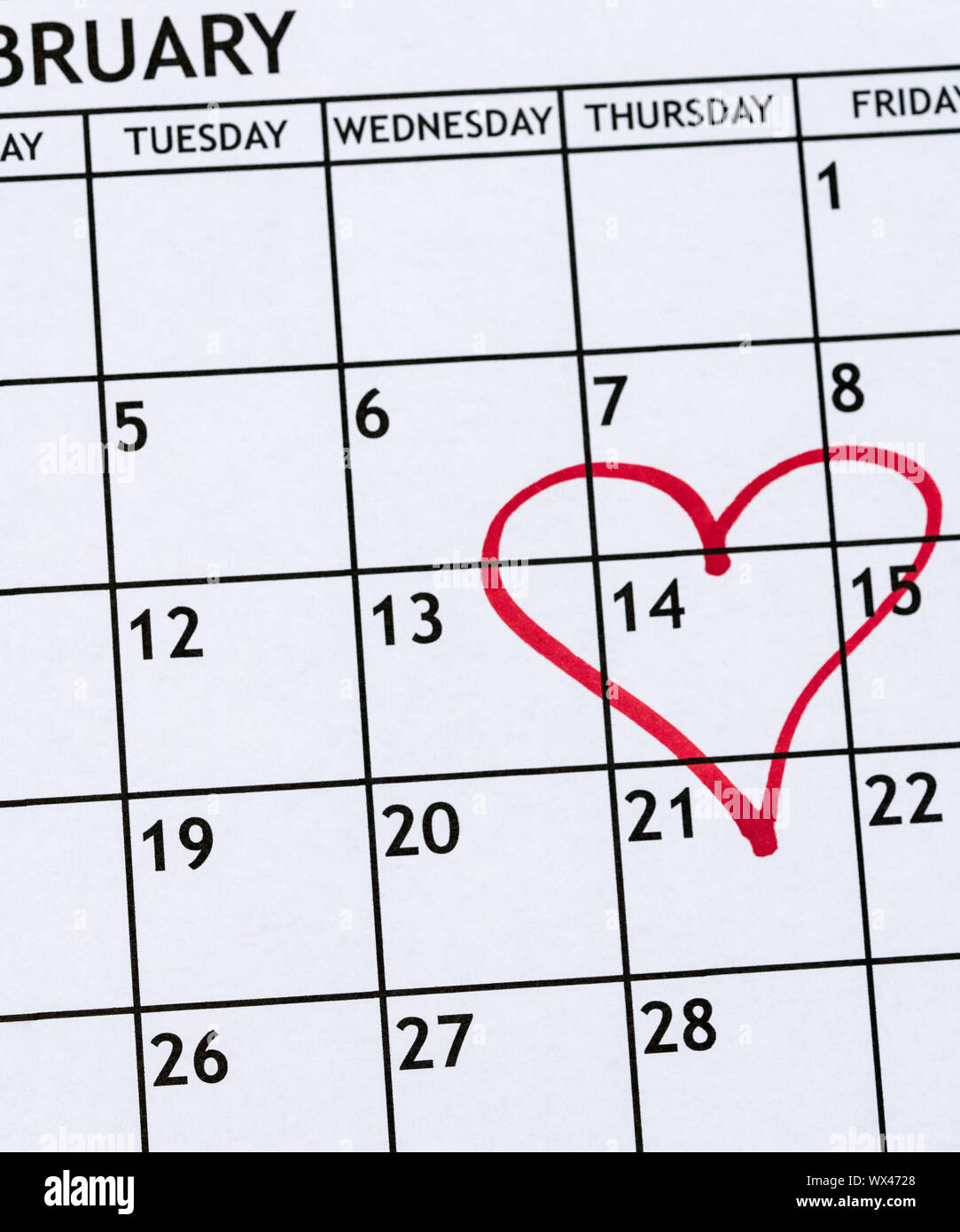 monthly calendar February detail view with a red heart drawn on the ...