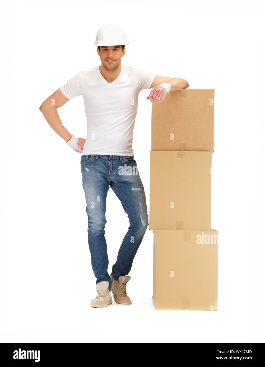 picture of handsome builder with big boxes Stock Photo - Alamy