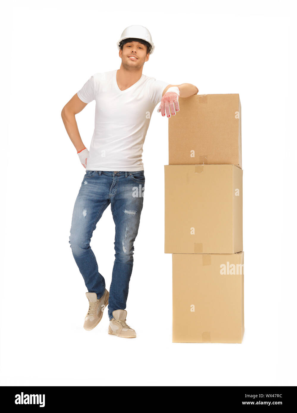 picture of handsome builder with big boxes Stock Photo - Alamy