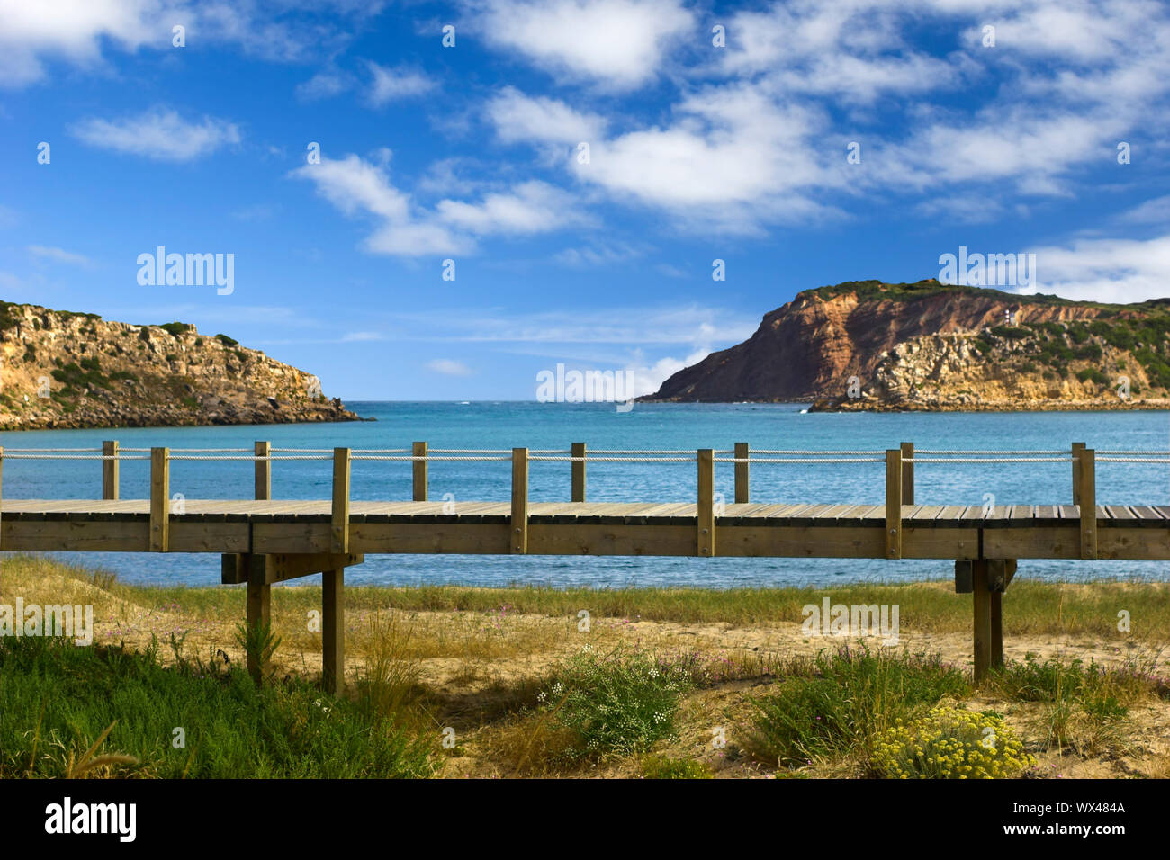 Picture of a Wood bridge crossing the beach Stock Photo - Alamy