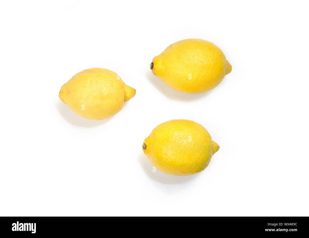 Three yellow lemons isolated on white background. Horizontal image ...