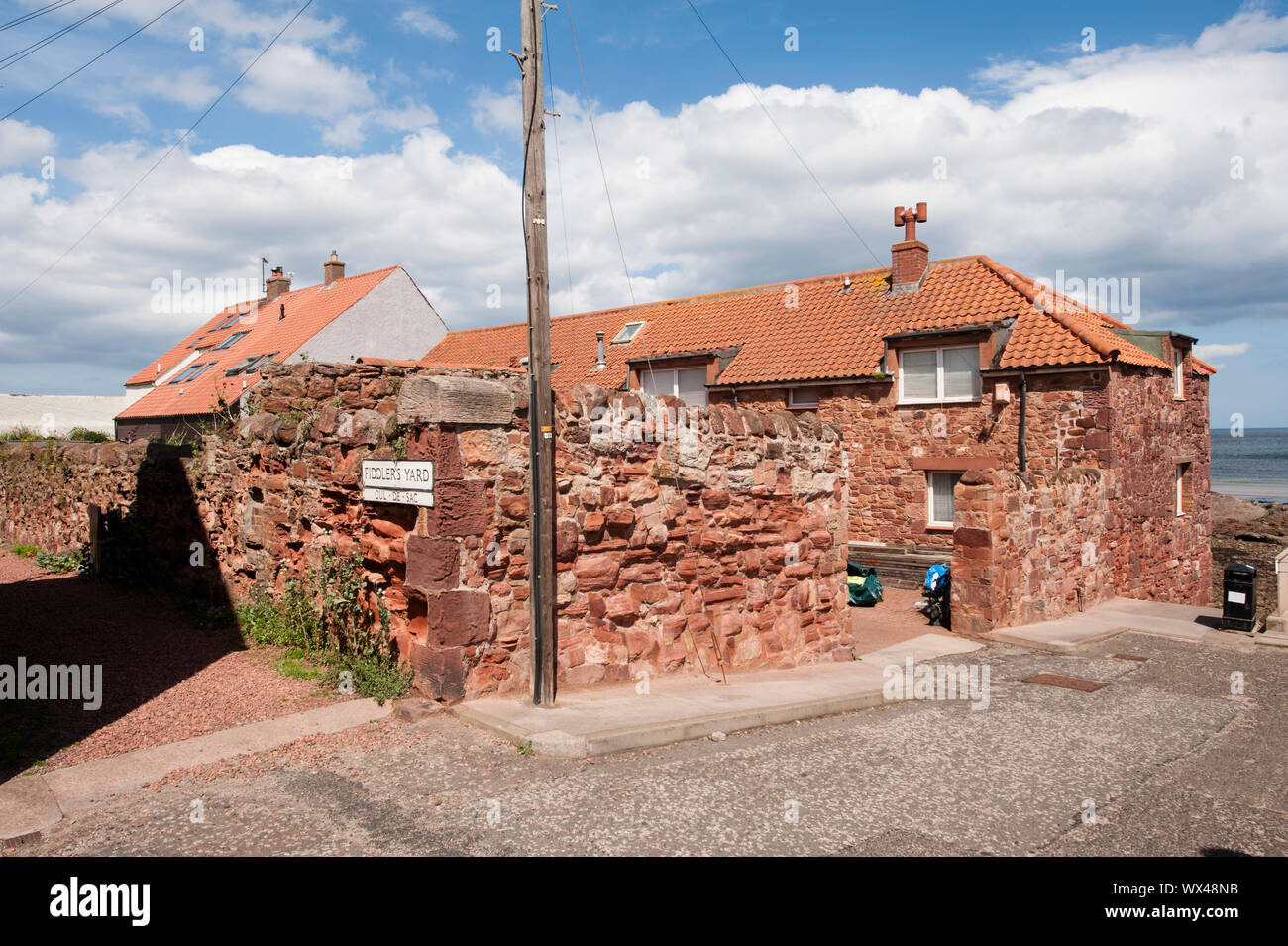 Red sandstone house in woodbrush Brae street. Dunbar is a town located ...