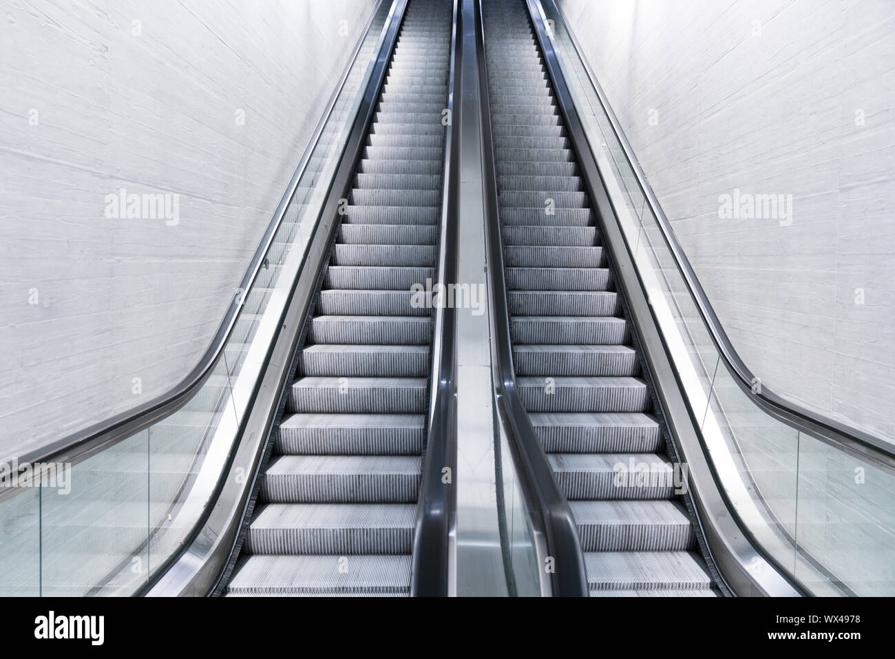 empty long escalator in a train station Stock Photo - Alamy