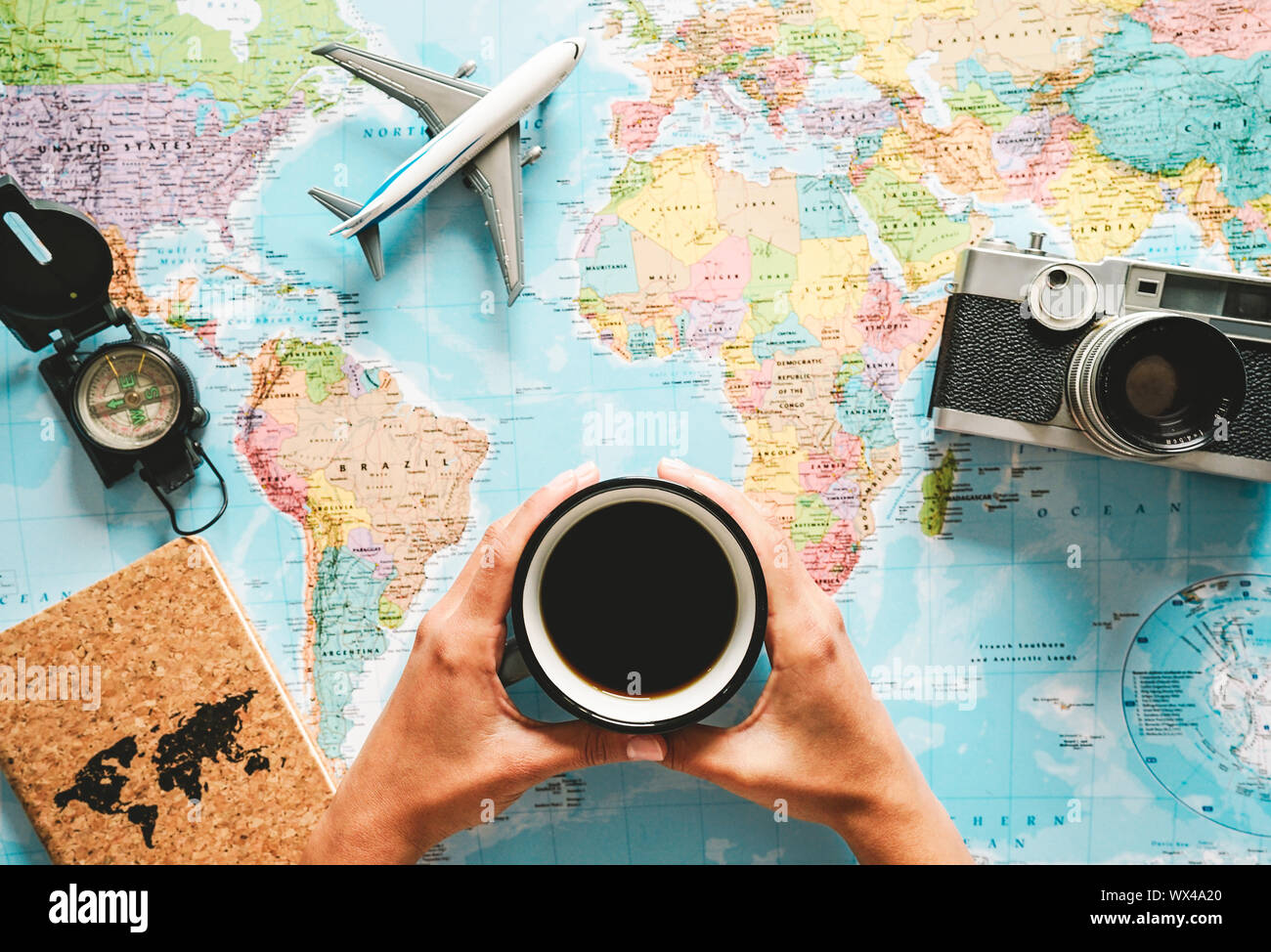 Pointing at world map hi-res stock photography and images - Alamy