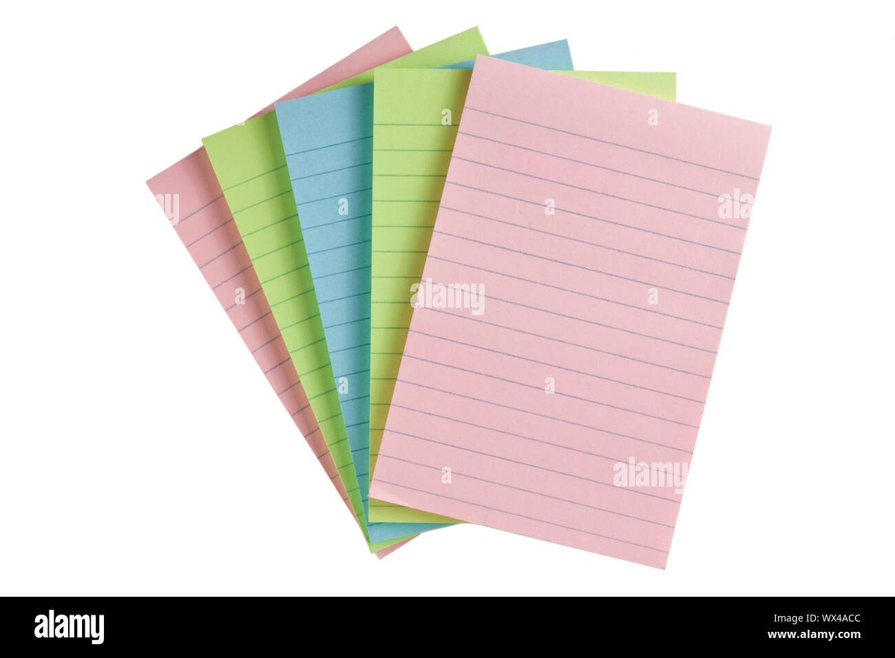 Image of colorful pad paper arranged on a white background Stock Photo ...
