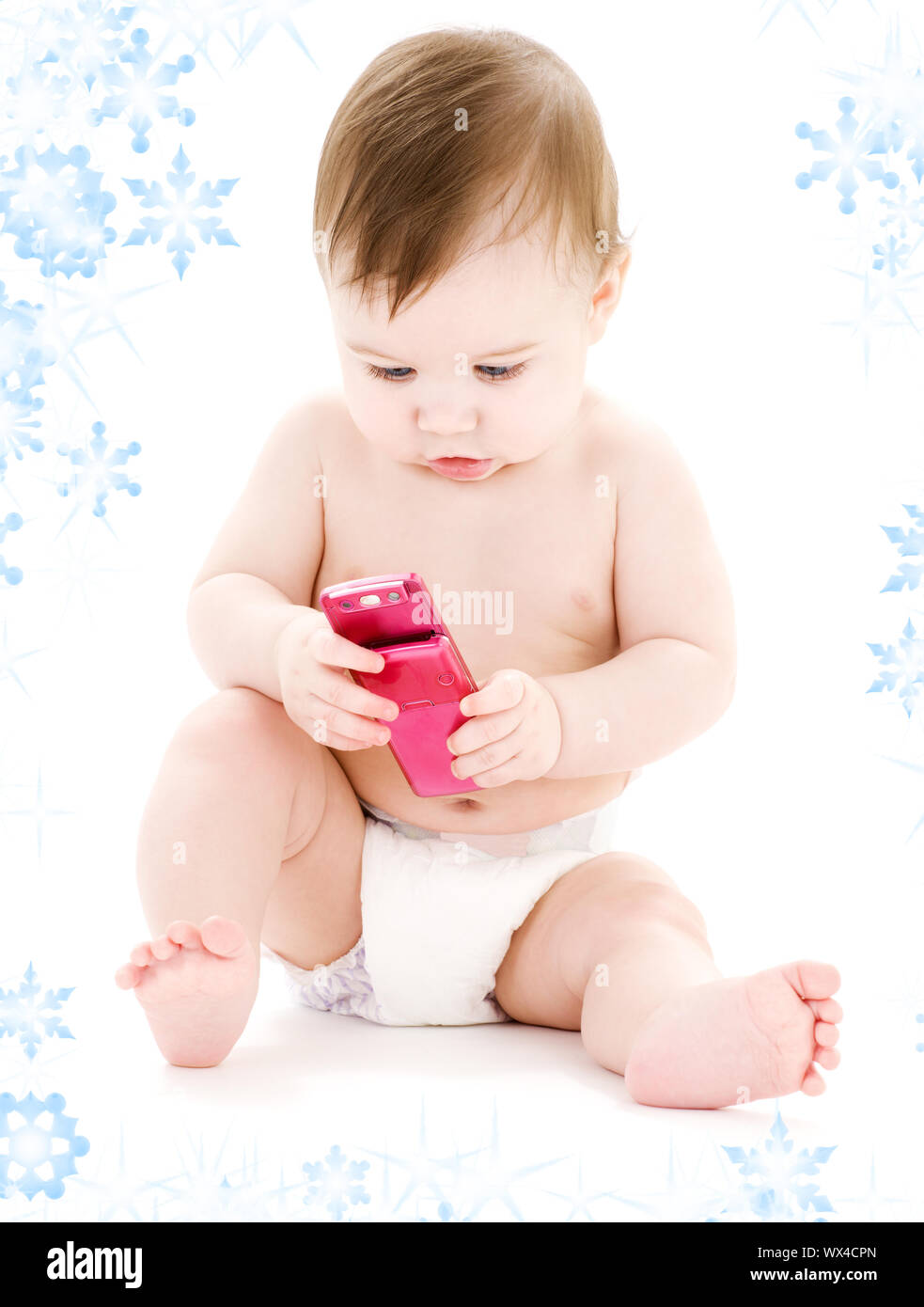 picture of baby boy in diaper with pink cell phone Stock Photo - Alamy
